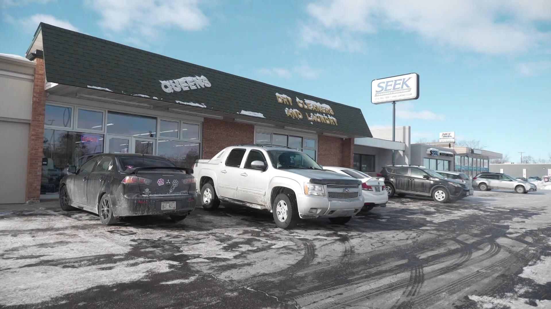 Queen’s Dry Cleaning cleans coats donated to HOM Furniture