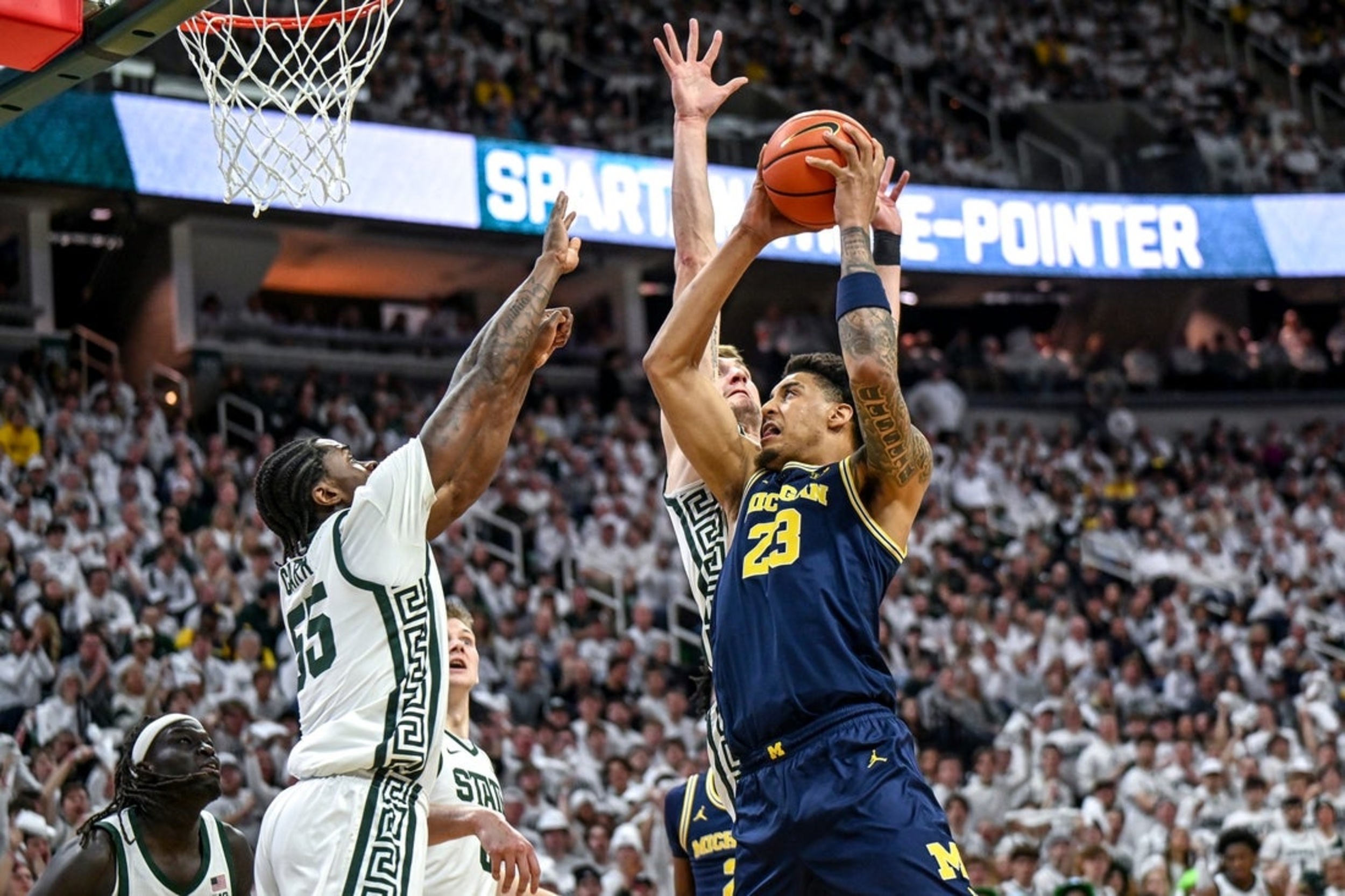 No. 3 Michigan tops No. 7 Michigan State to grab Big Ten lead