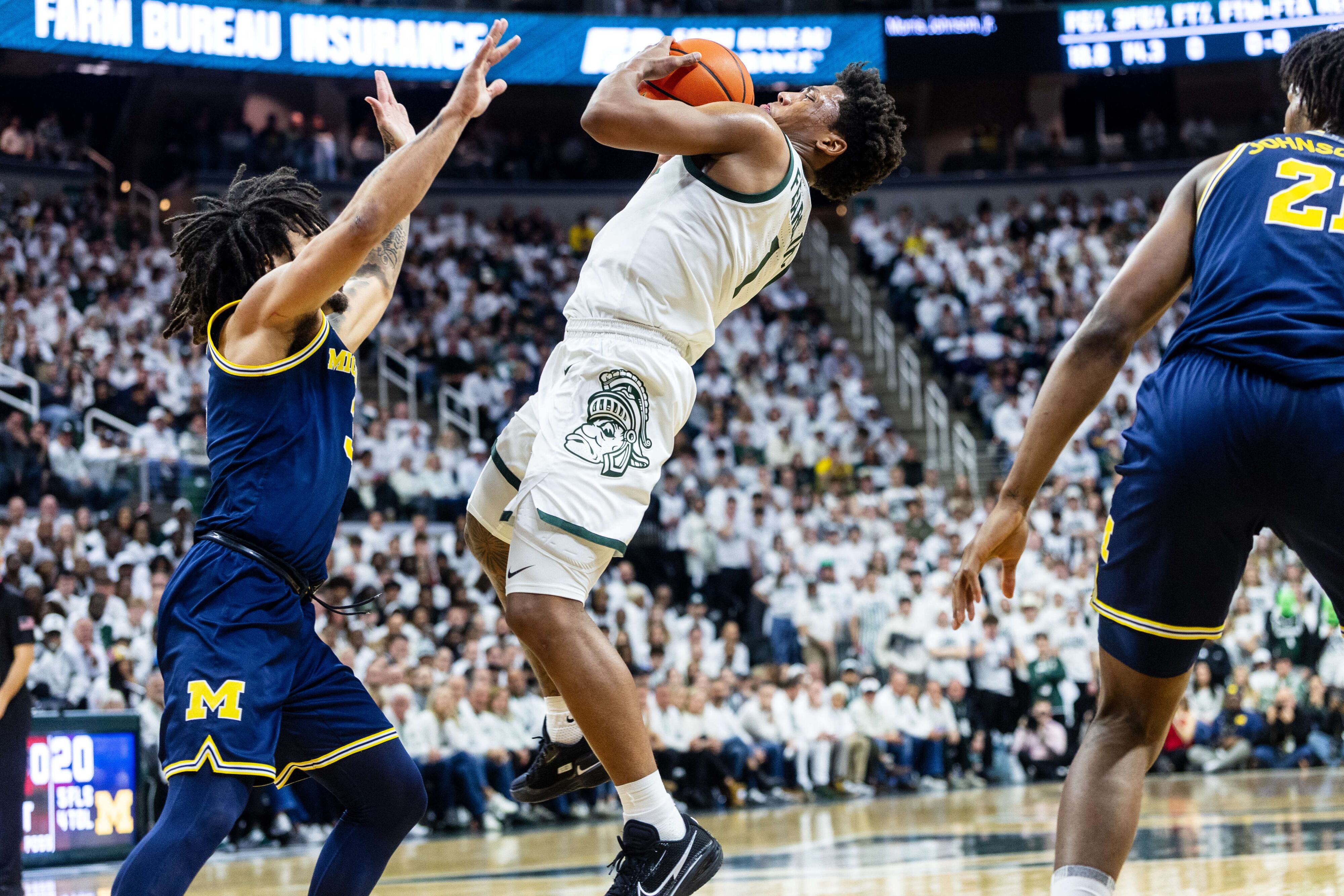 Michigan fends off Michigan State rally for first rivalry road win in ...