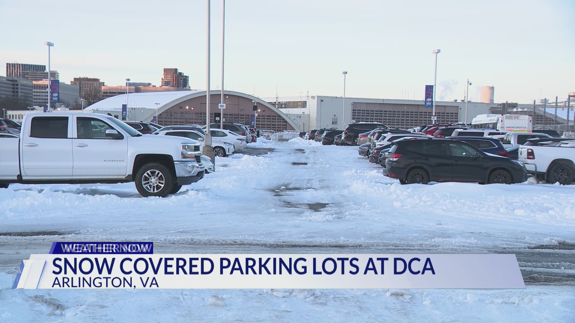 Snow-covered parking lots at DCA