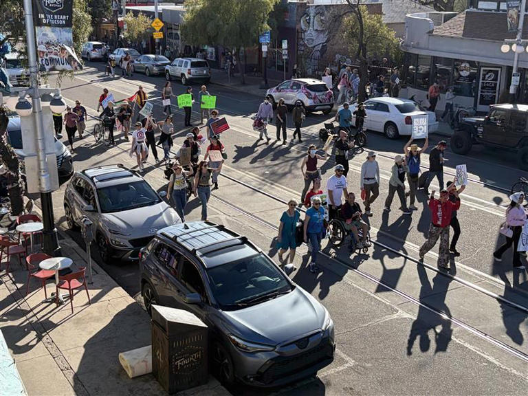Tucson businesses close, hundreds protest on National Day of Action