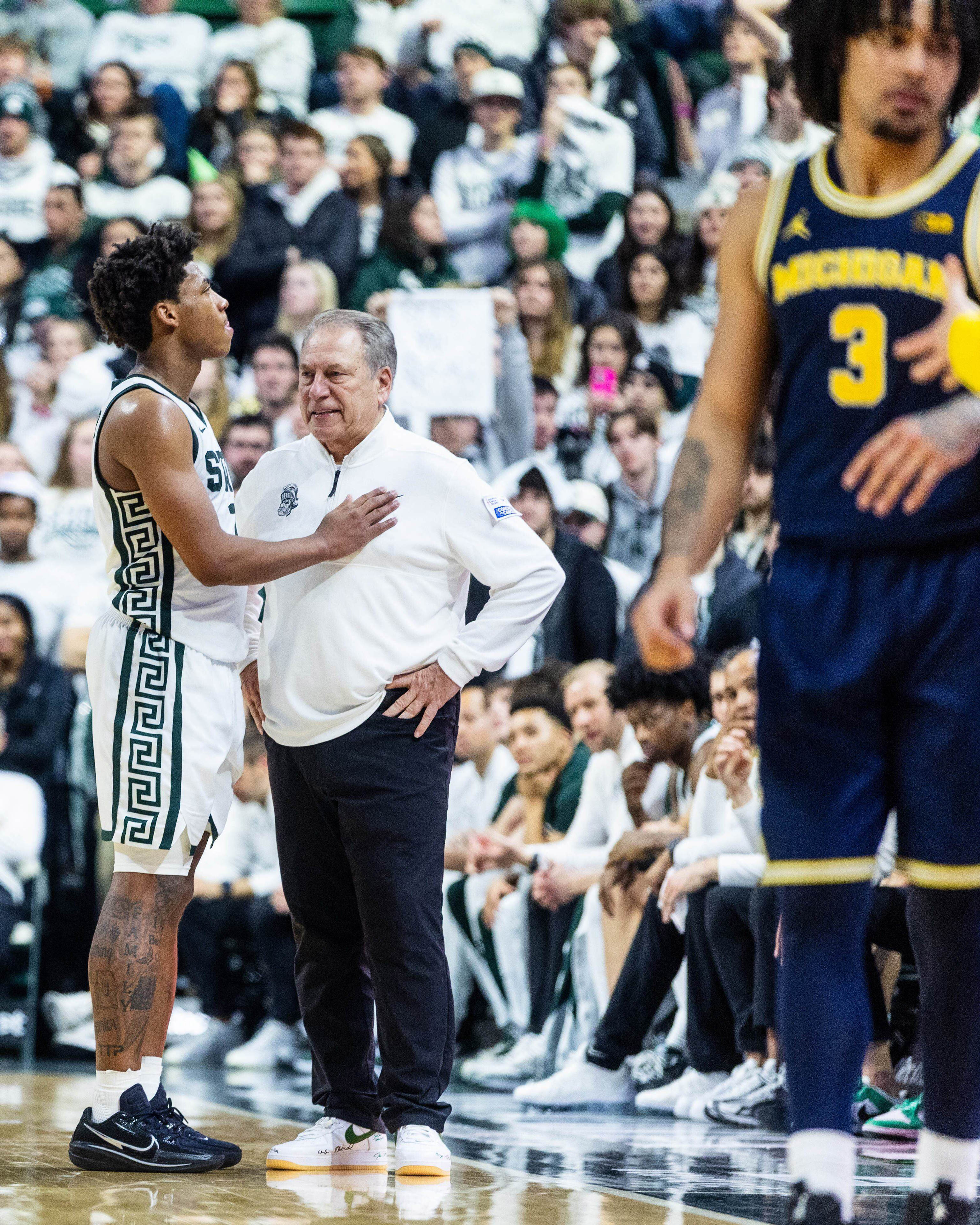 See photos as No. 3 Michigan defeats No. 7 Michigan State, claims first ...