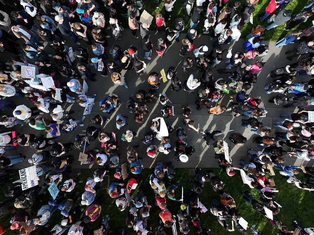 Protesters across the US call for nationwide strike against Trump's ...