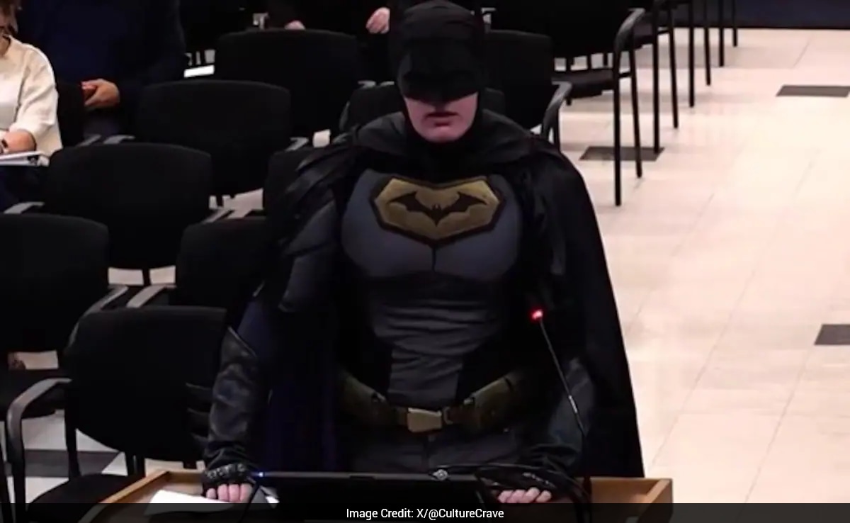 Watch: Man dressed as Batman slams US officials about ICE presence at ...