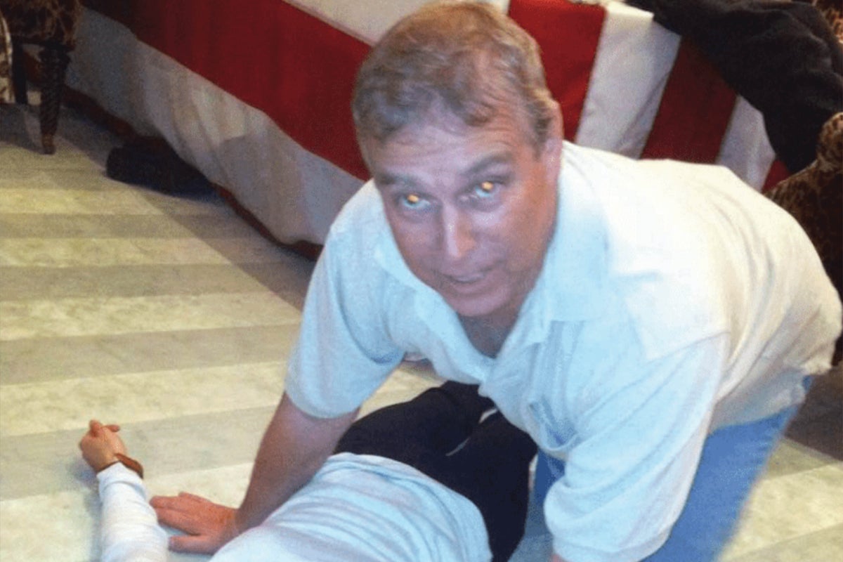 Epstein file pictures appear to show Andrew on floor with woman