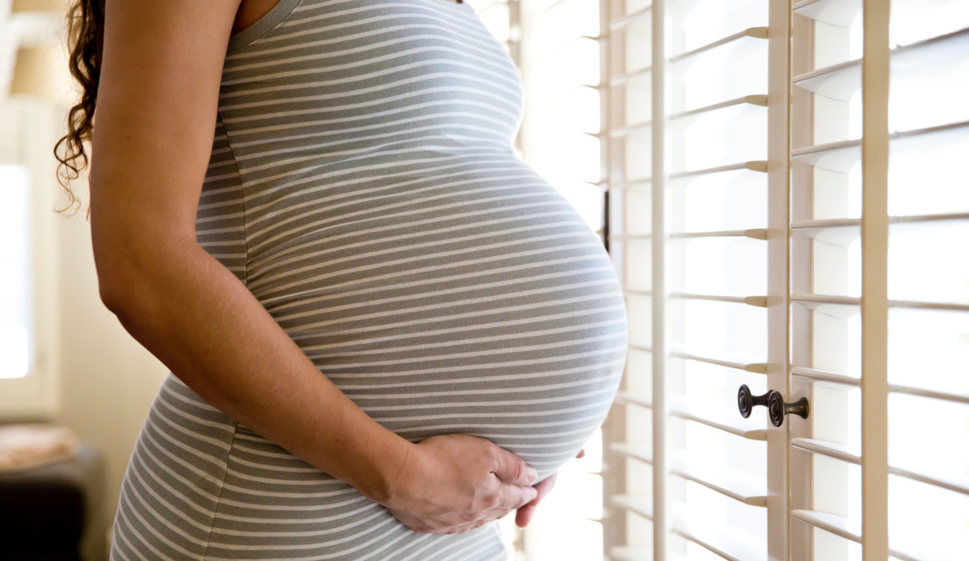 Pregnant woman carrying triplets sparks conversation after showing her ...