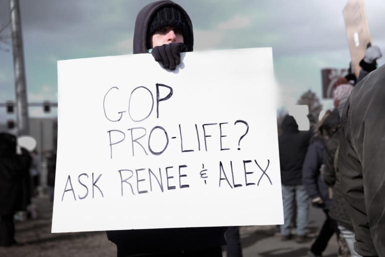Crowd braves winter weather to protest ICE in downtown Huntsville