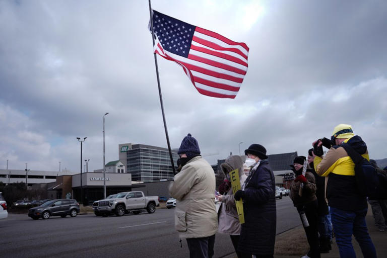 Crowd braves winter weather to protest ICE in downtown Huntsville