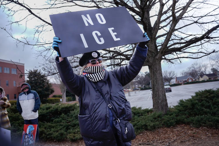 Crowd braves winter weather to protest ICE in downtown Huntsville