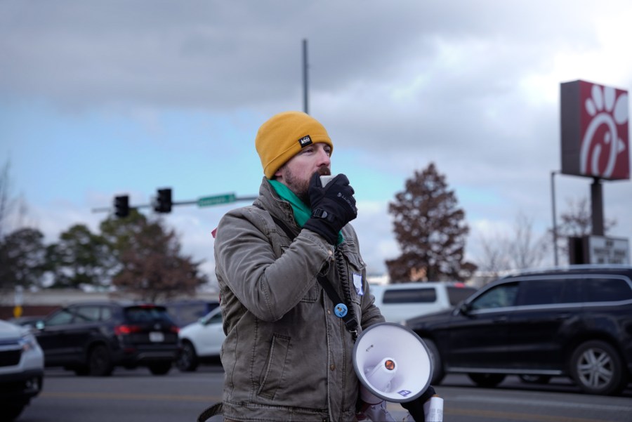 Crowd braves winter weather to protest ICE in downtown Huntsville