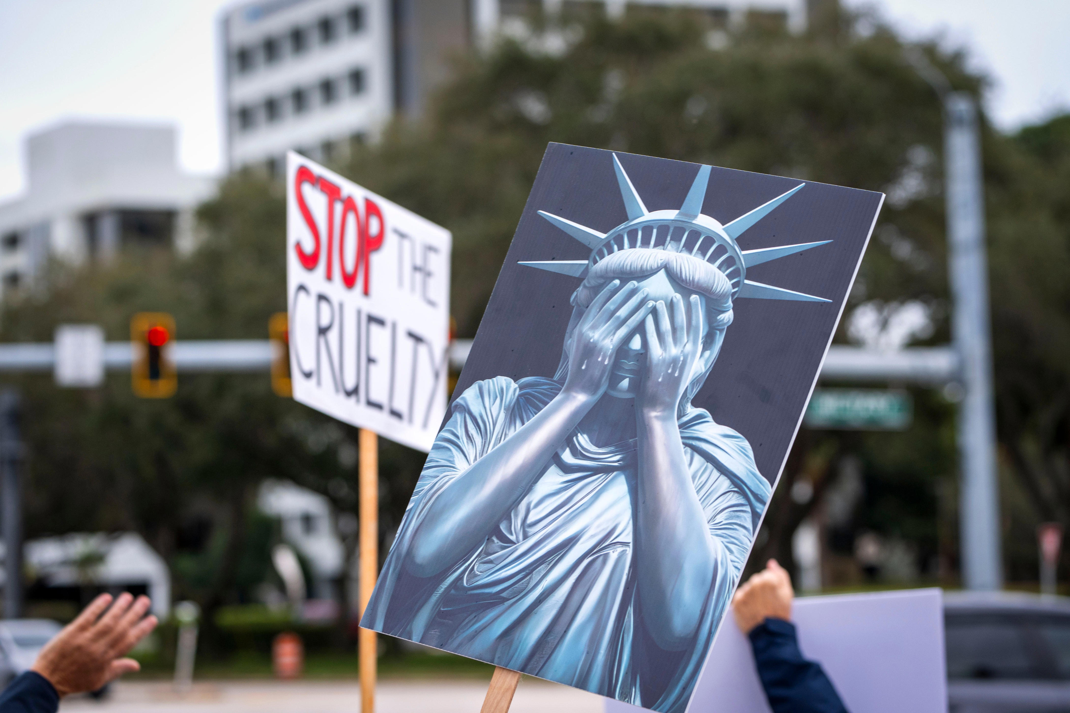 'ICE OUT' rally draws 300 to Gardens protesting immigrant detentions