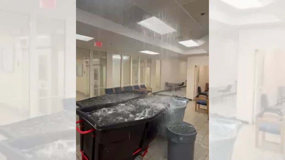 Water pouring from ceiling of Fulton County Jail after pipe burst