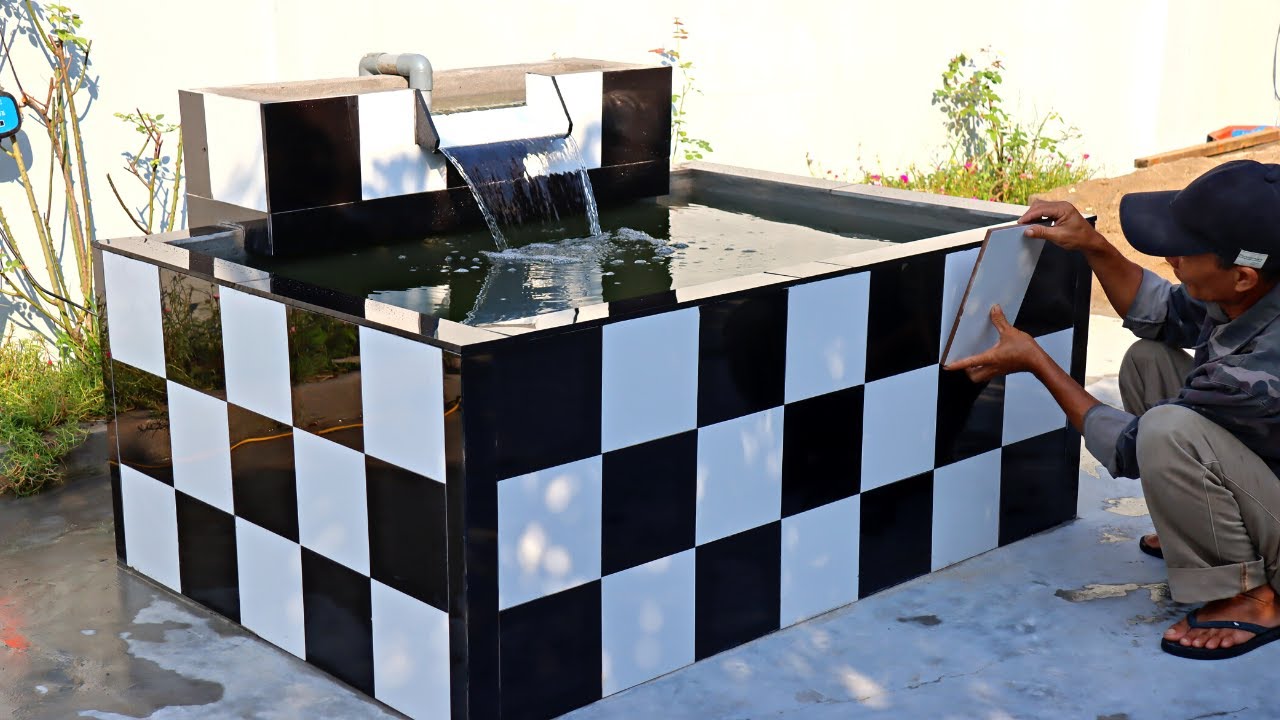 Excellent techniques in construction of fish tanks using black, white ...
