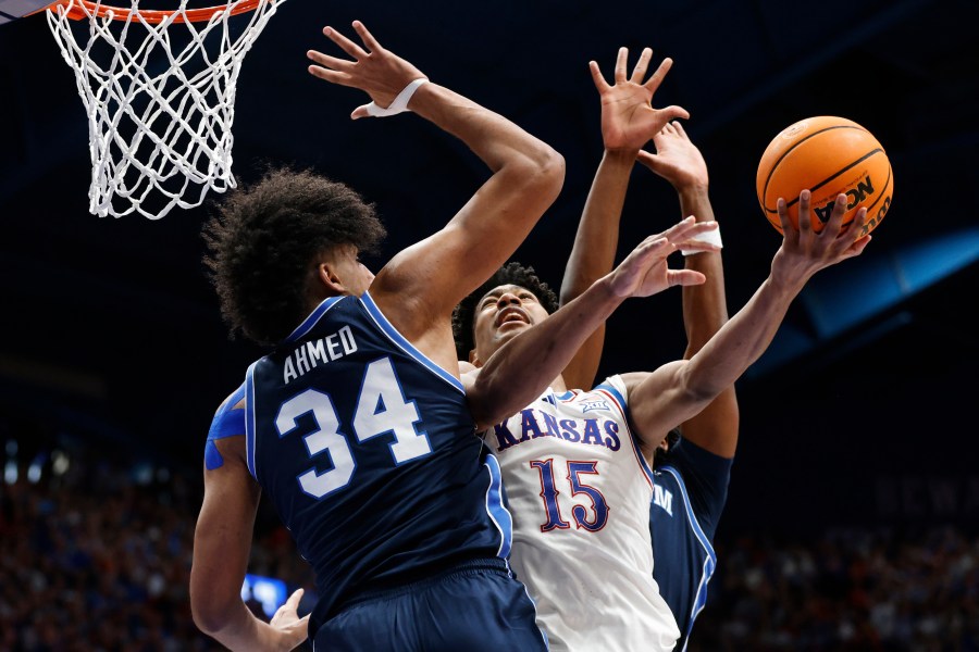 Kansas outlasts BYU in top-15 matchup