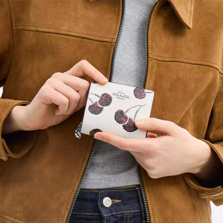 Coach Outlet's cute cherry print wallet is now 70% off, and it's the ...