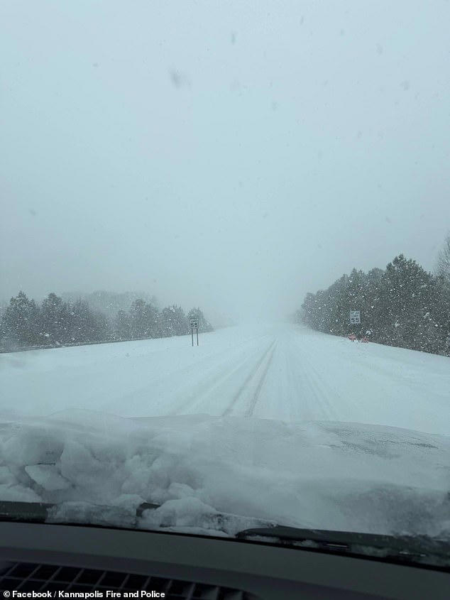 Worst blizzards in two decades leave hundreds stranded as bomb cyclone ...