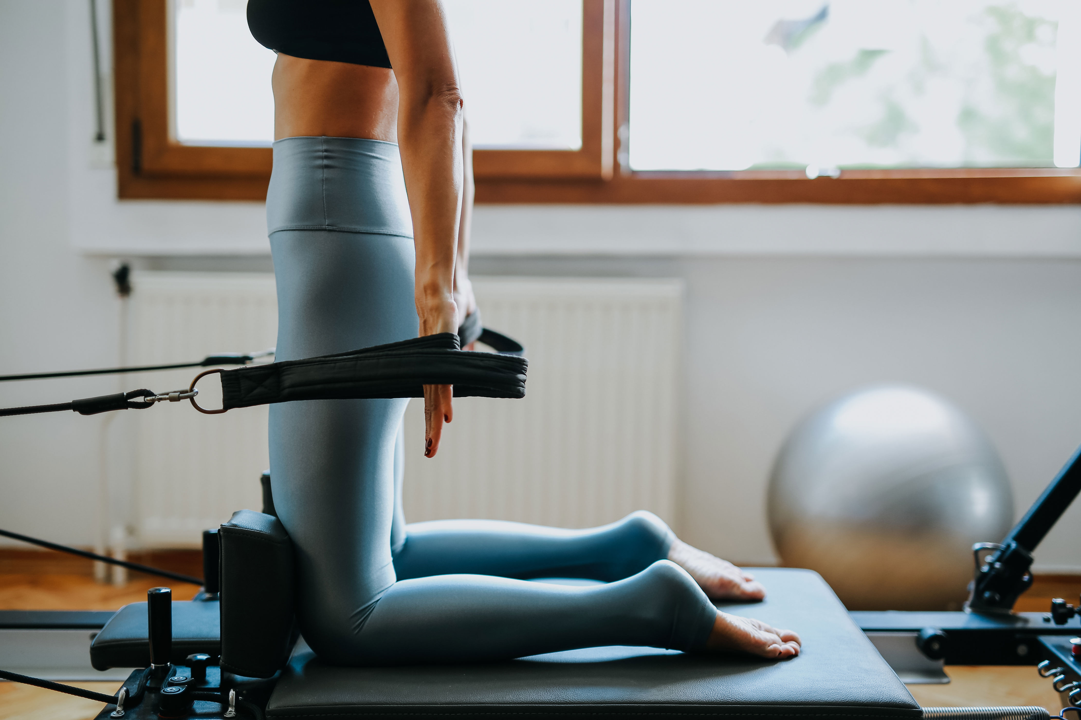 Reformer pilates vs mat pilates: welke work-out is het meest effectief?