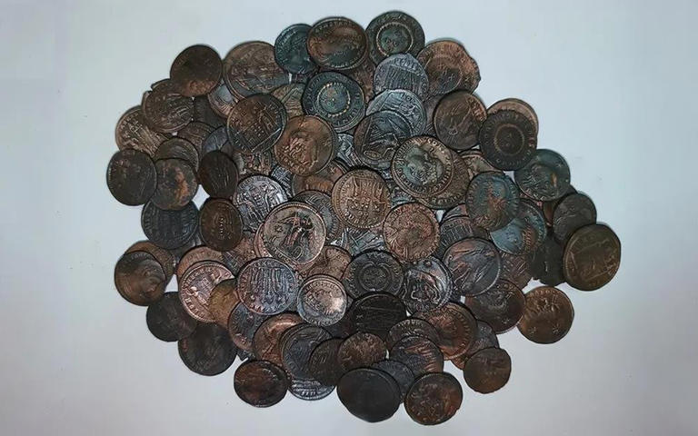 Divers uncover world’s largest late Roman hoard with 50,000 coins ...