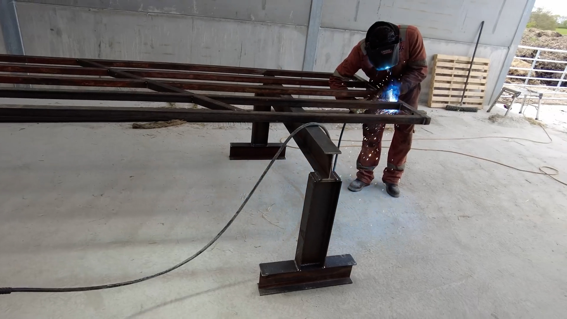 Building steel frames the old school way