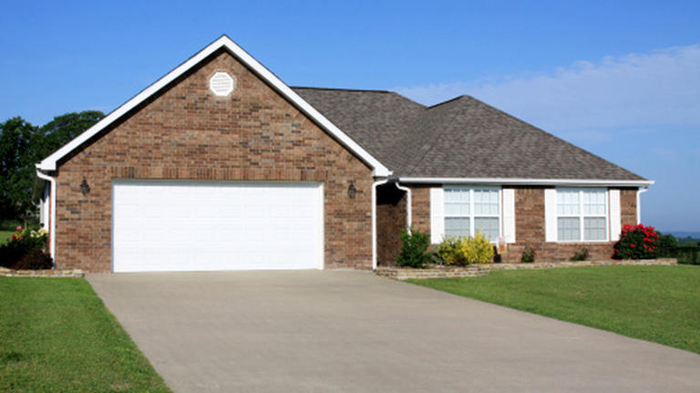 Say goodbye to plain concrete: The driveway design tactic that looks ...