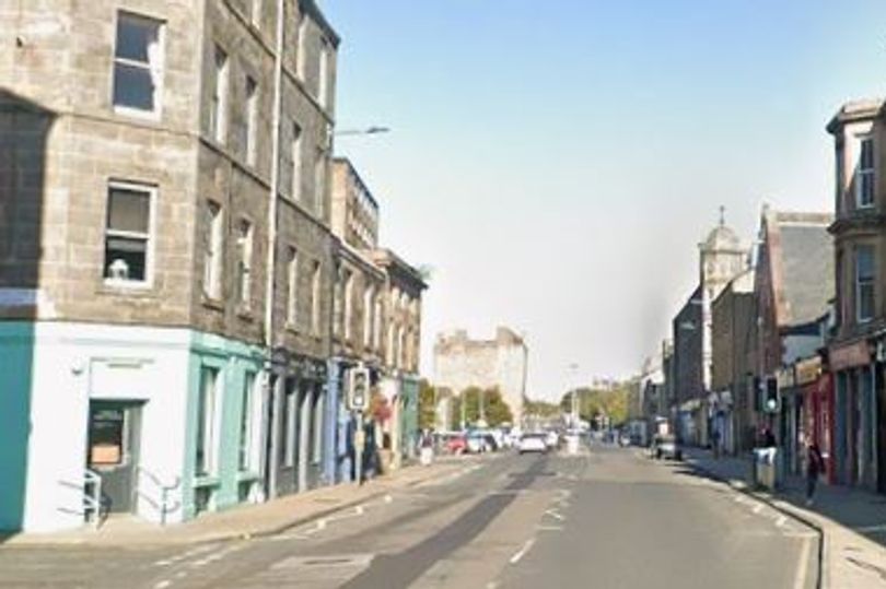 Edinburgh shopkeeper threatened and robbed of three-figure sum as ...