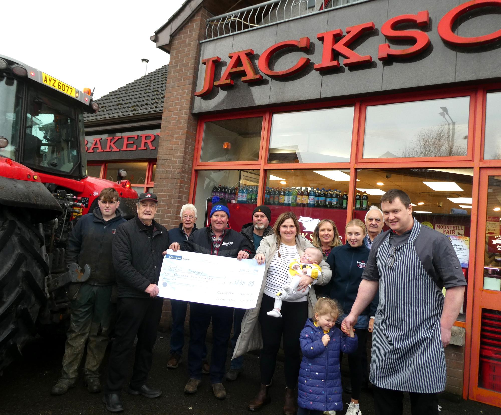 Cheque for £3,200 in aid of Just4Children