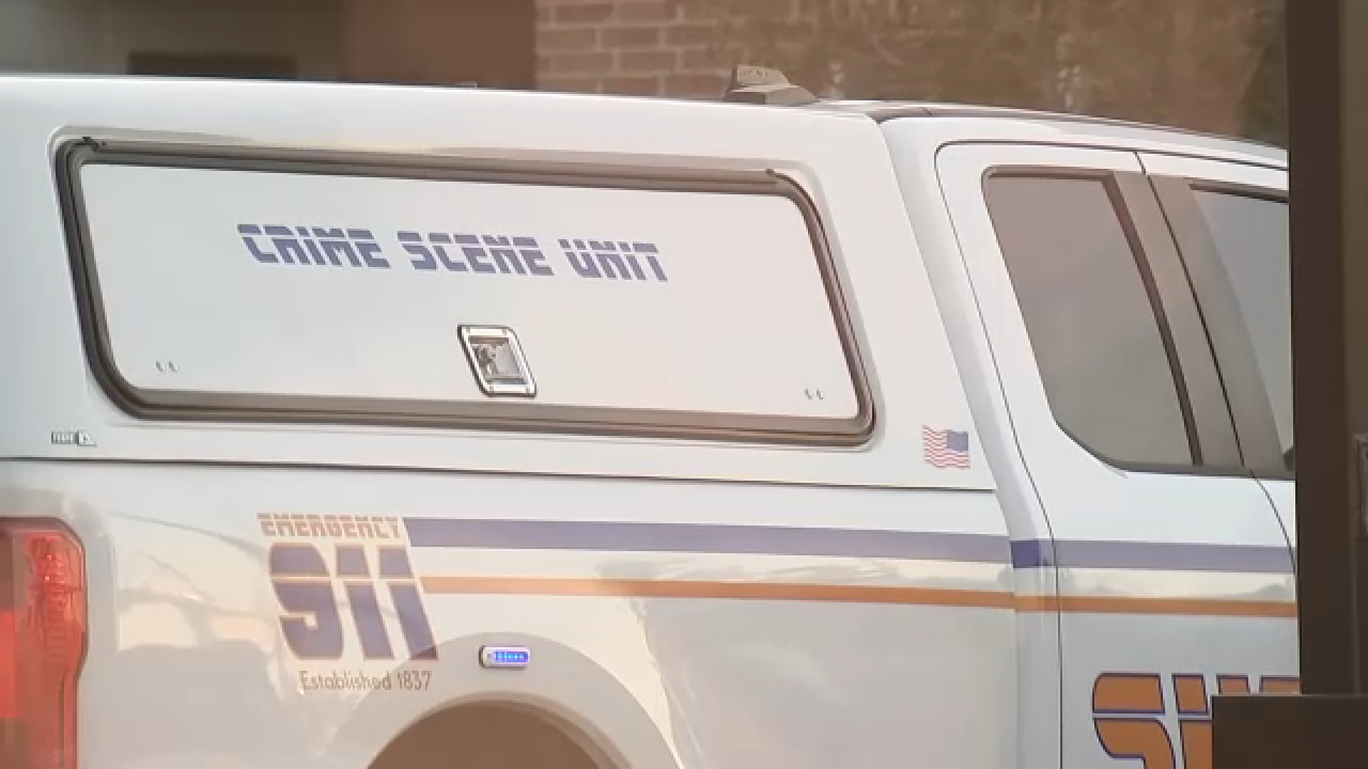 Man charged after his brother found dead in bathroom with head trauma ...