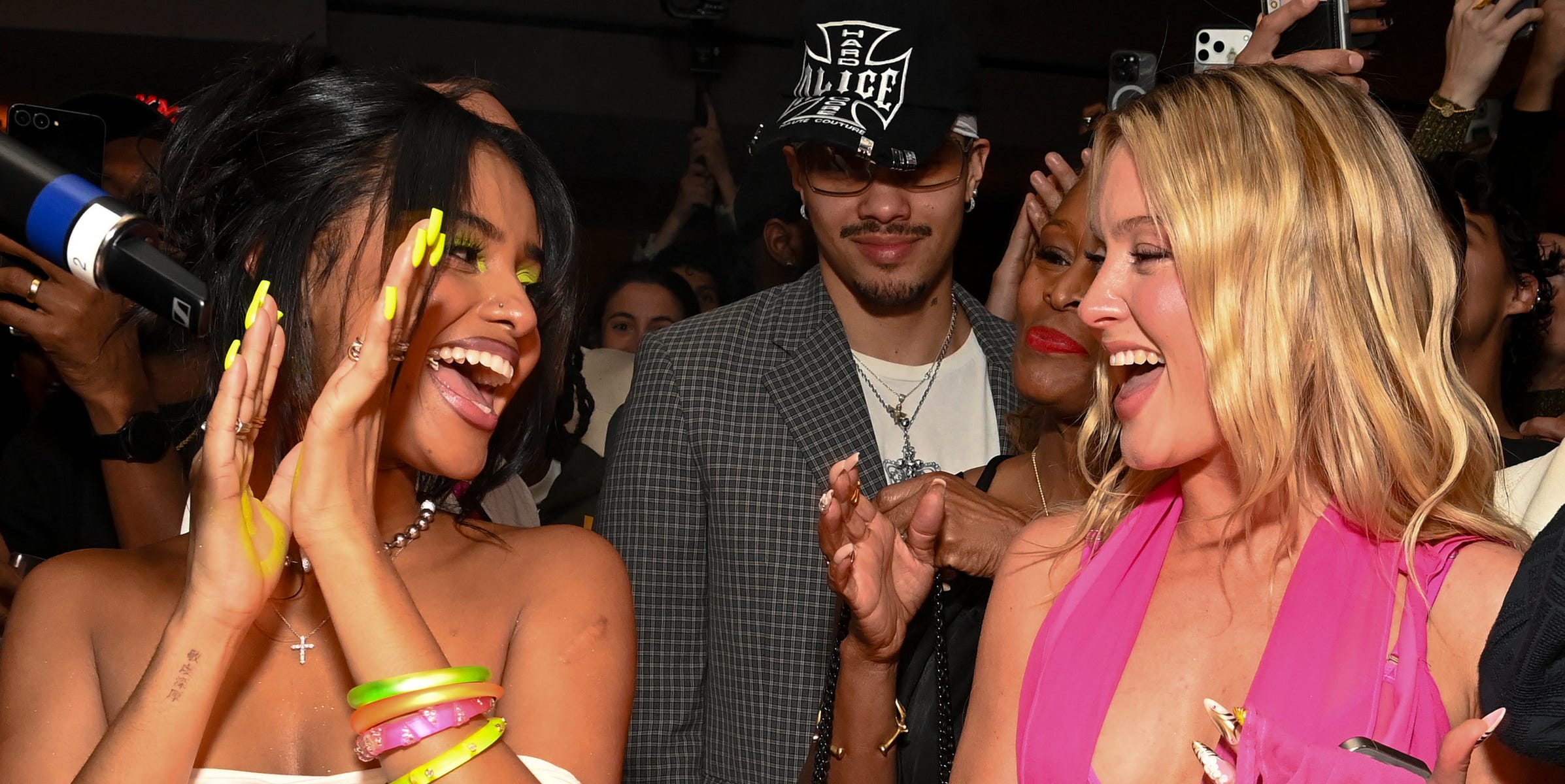 Tyla’s birthday-girl look includes a custom minidress and tons of ’90s neon