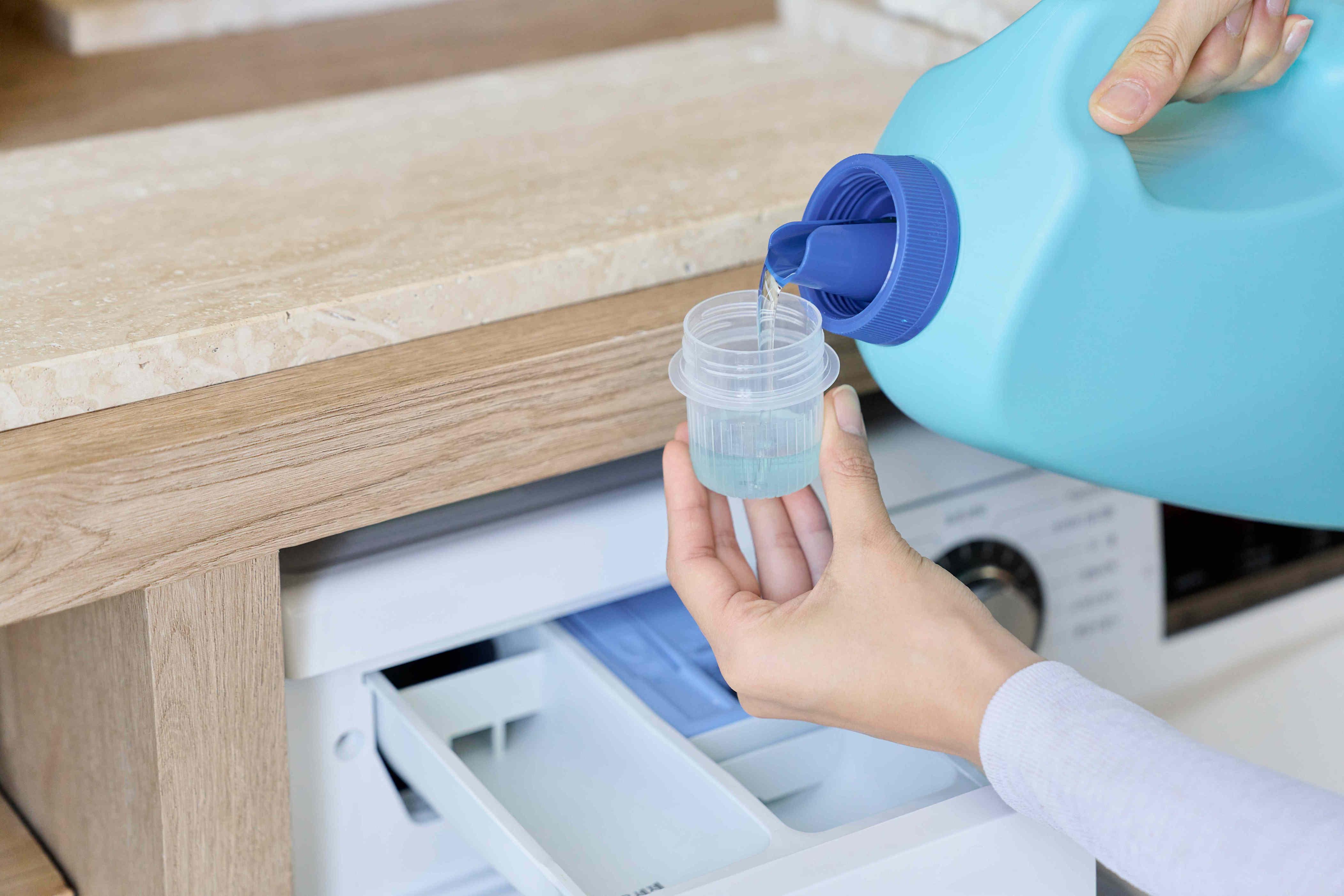 Why you should never toss your detergent cup in the washing machine—and ...