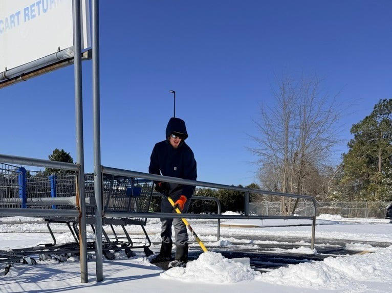 Spring Lake presses on as rare snow blankets town