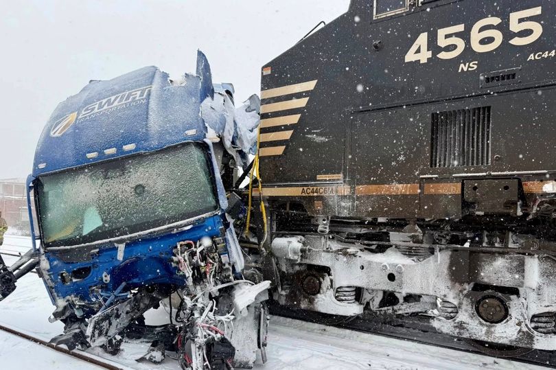 Dramatic video shows train smash into articulated lorry in freezing ...