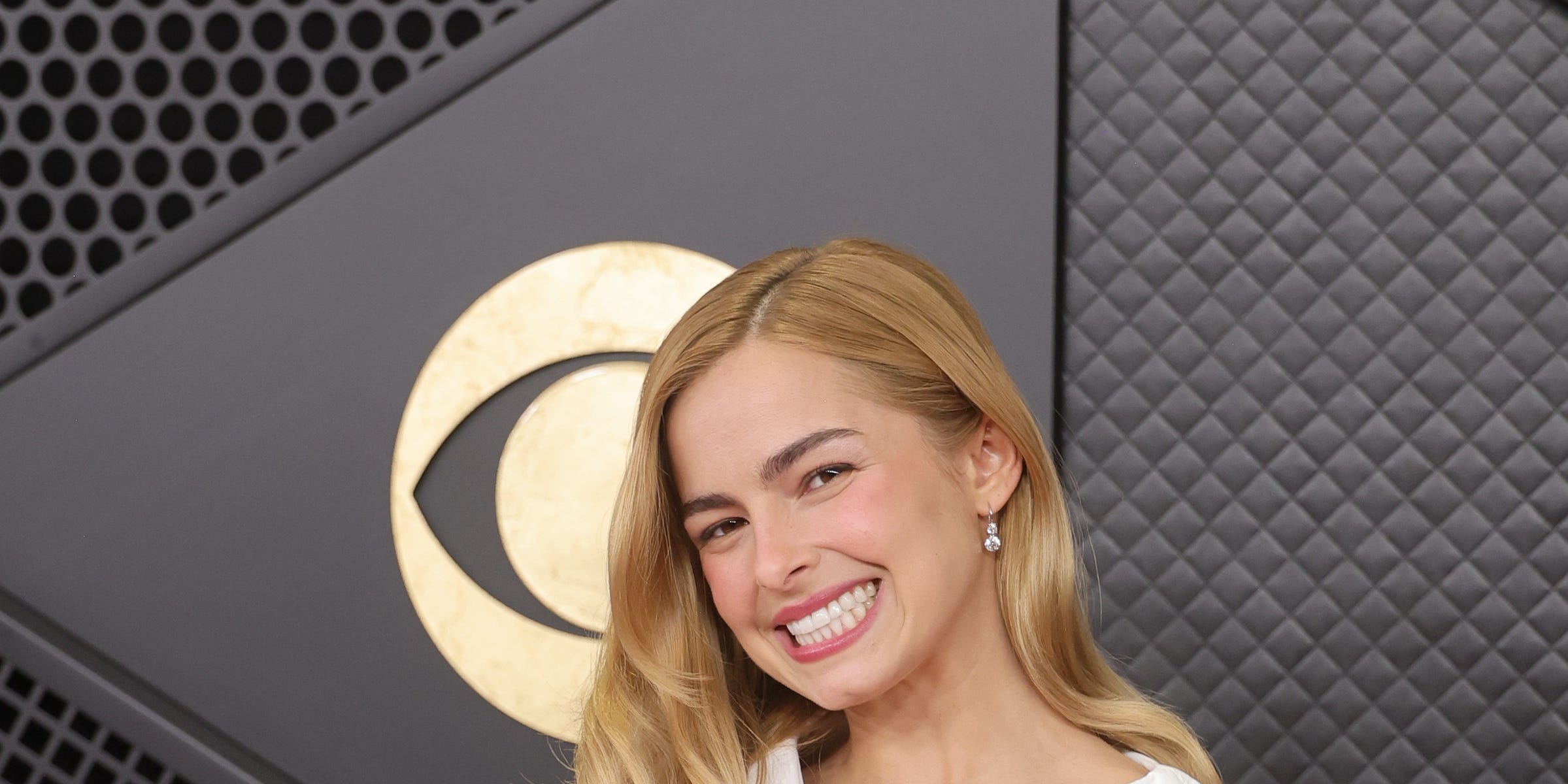 Addison Rae brings the drama in a plunging Alaïa dress at the 2026 Grammys