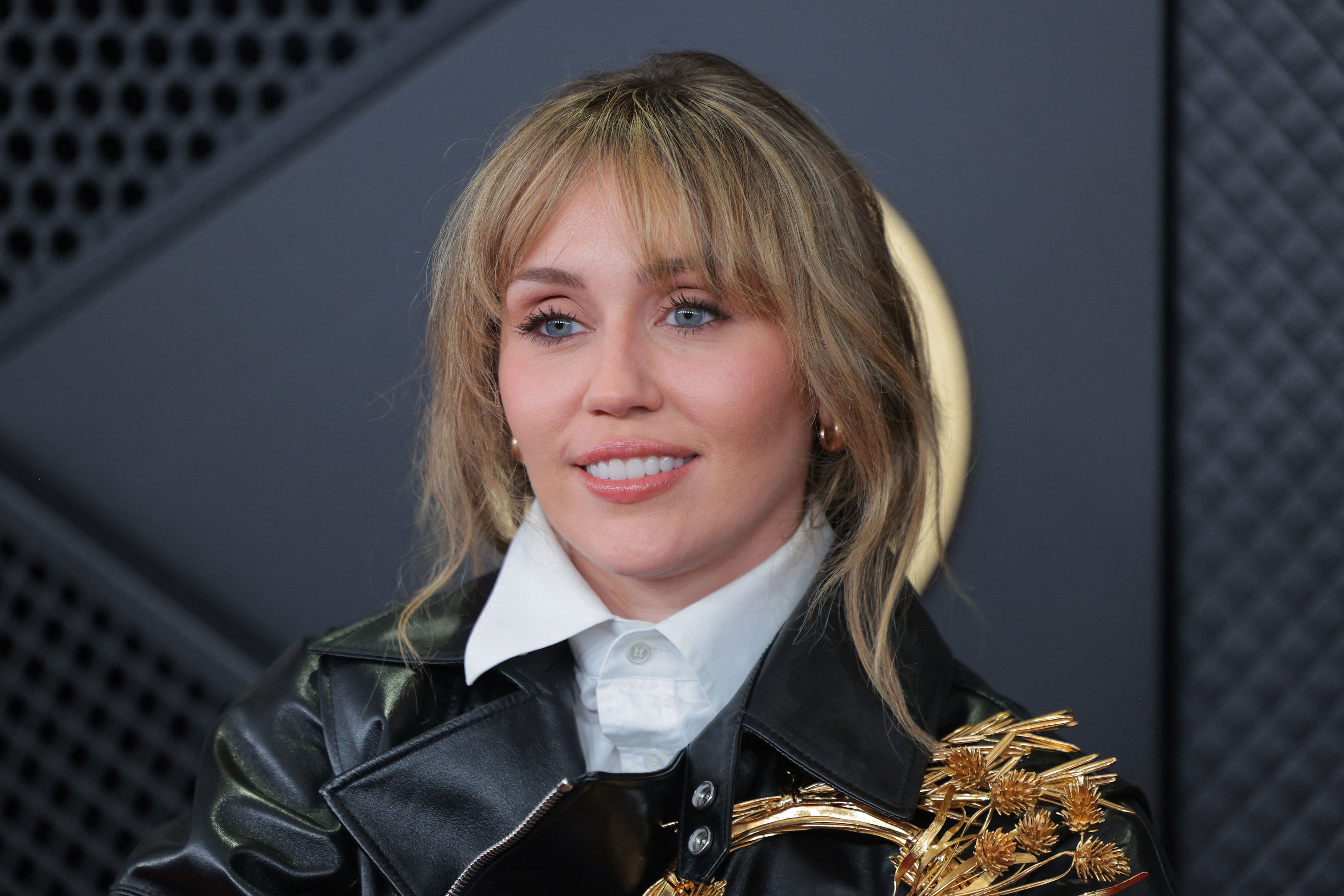 Miley Cyrus goes rock 'n' roll in black leather on Grammys 2026 red carpet