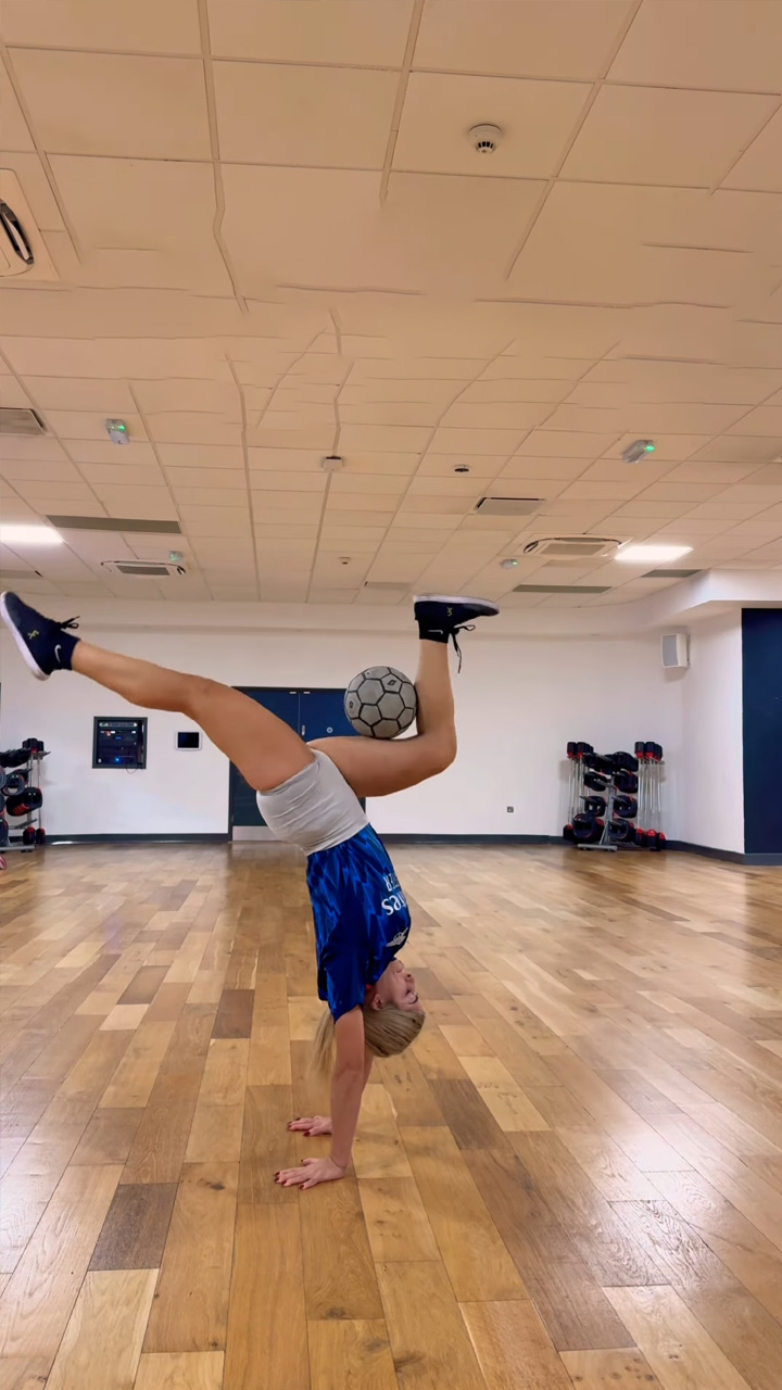 Handstand exercise with football control
