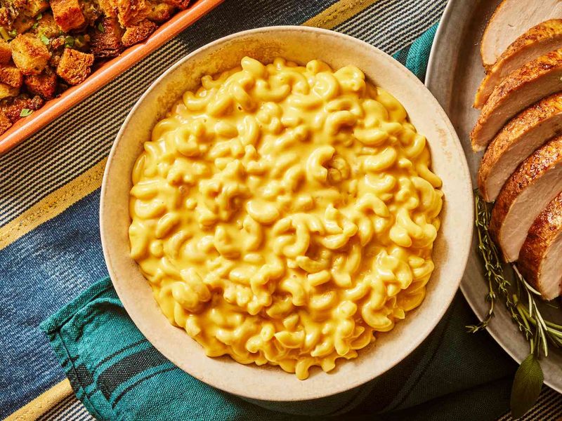 Iconic global comfort foods and dishes eaten standing in the kitchen at ...