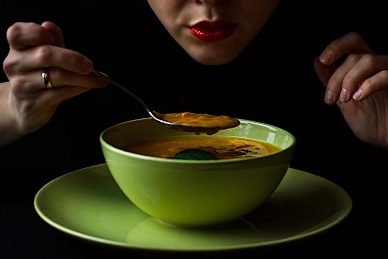 Iconic global comfort foods and dishes eaten standing in the kitchen at ...