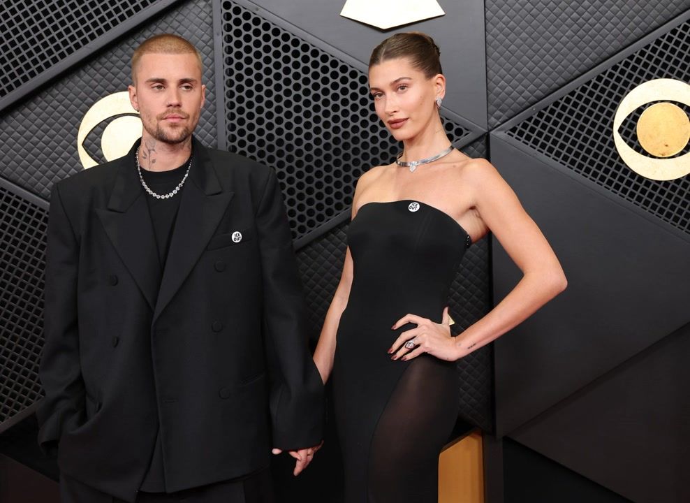 Celebs wear ICE out pins at Grammys