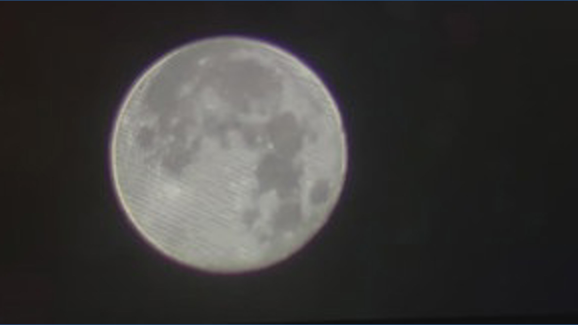 Full snow moon seen above Austin