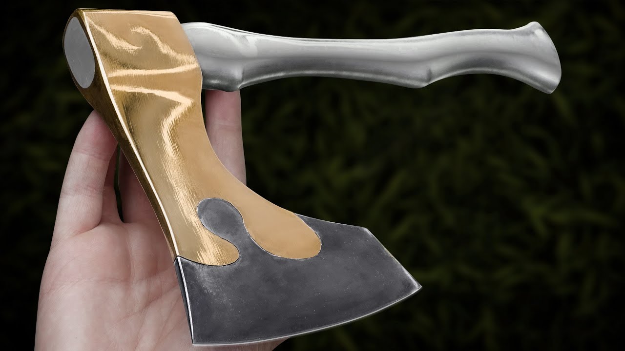 I crafted a tri-metal dovetail hatchet!