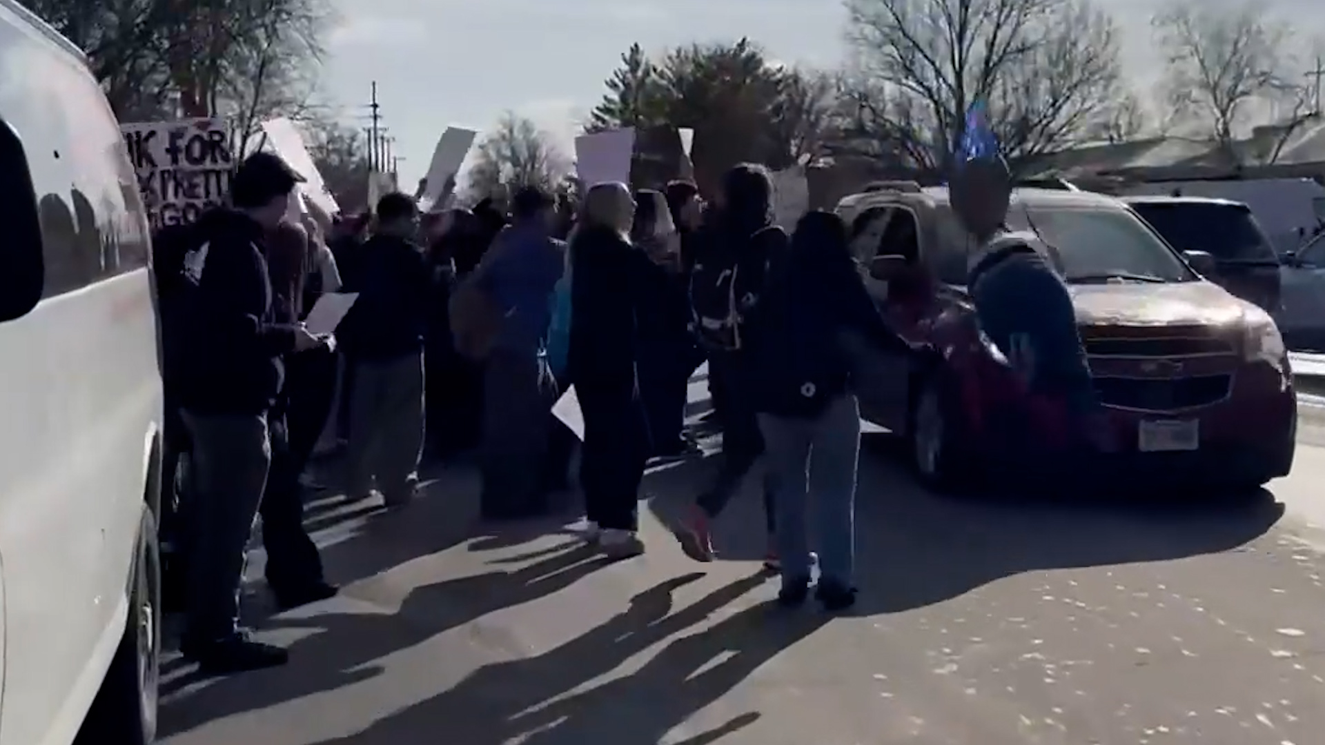 Driver flying Trump flag hits high school student during anti-ICE protest