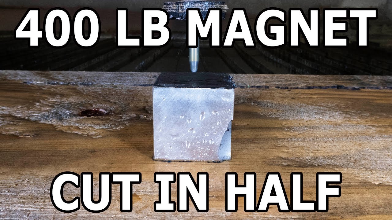 Huge neodymium magnet cut in half with a 60,000 PSI waterjet - 400 lbs