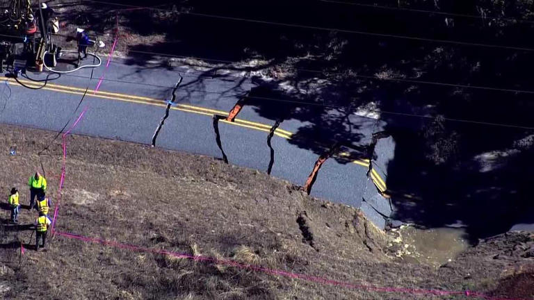 Road collapses into 50-foot hole in Lake County