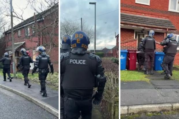 Watch dramatic moment police raid house in Blackburn estate