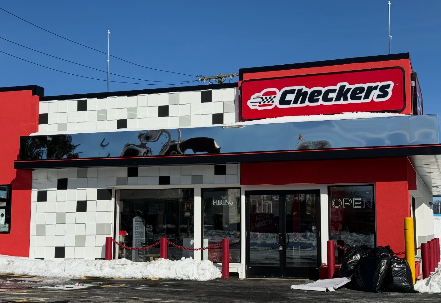 When is Checkers’ first New England restaurant opening in Mass.?