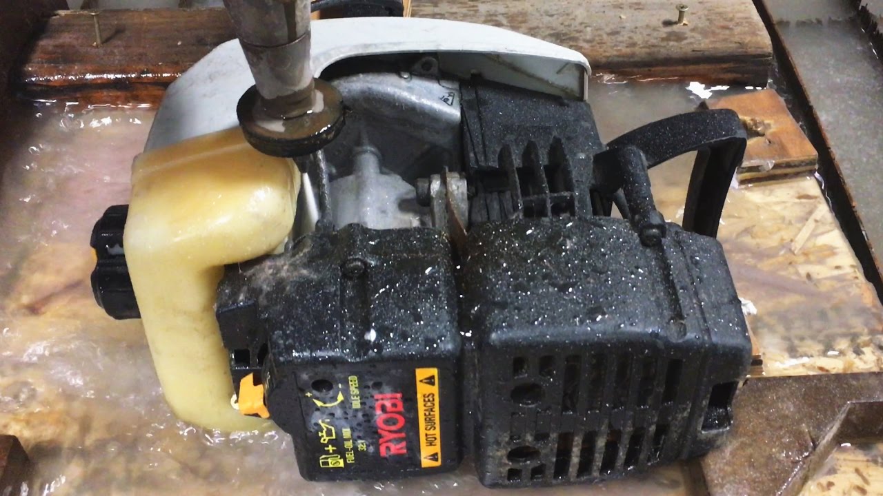 Engine cut in half with a 60,000 PSI waterjet - cutting weed wacker ...