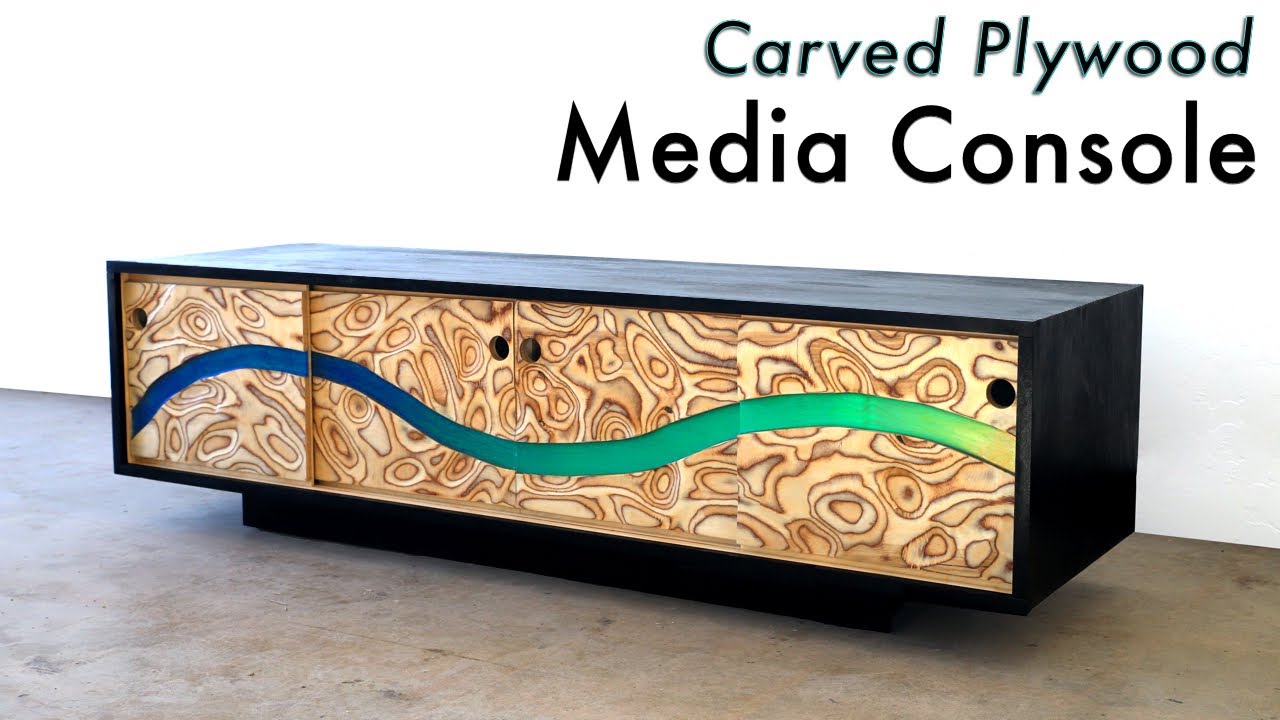I built a carved plywood TV stand with epoxy river!