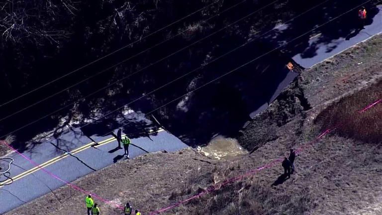 Road collapses into 50-foot hole in Lake County