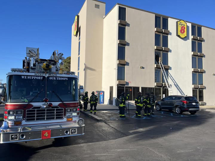 Crews rescue person hanging out of third-floor hotel window during ...