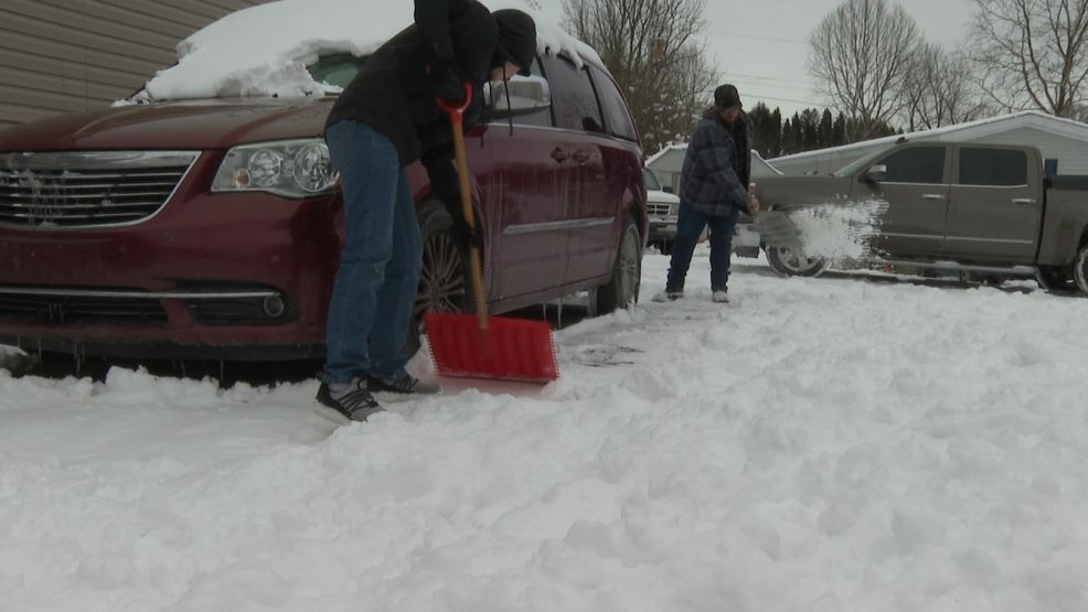Community clears snow as region grapples with its highest total in 7 years