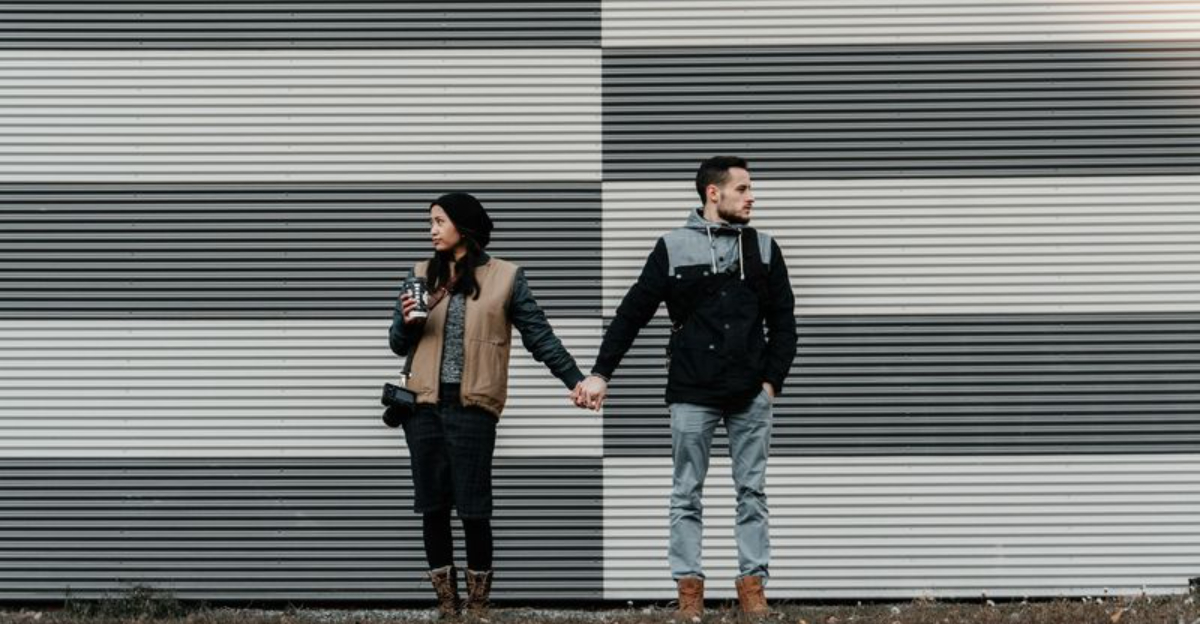 14 quiet signs a person isn’t happy in their marriage—even if they say ...